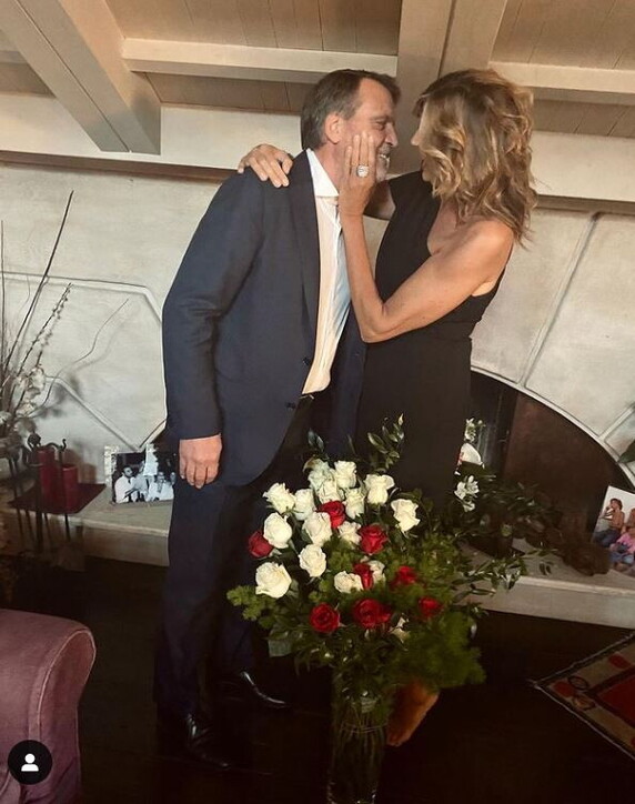 Myrta Merlino in topless al mare marca stretto Marco Tardelli